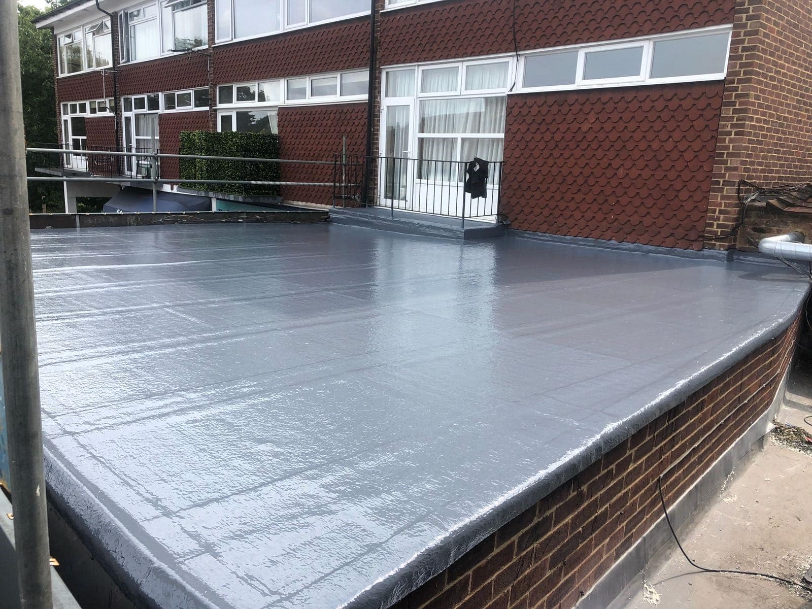 Sealing Excellence: Flat Roof Fibreglass Cold Applied Liquid Membrane